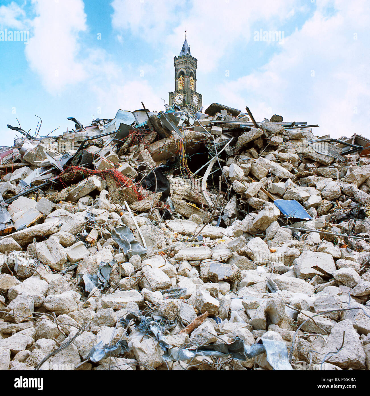 Pile of rubble in front of clock tower Stock Photo - Alamy