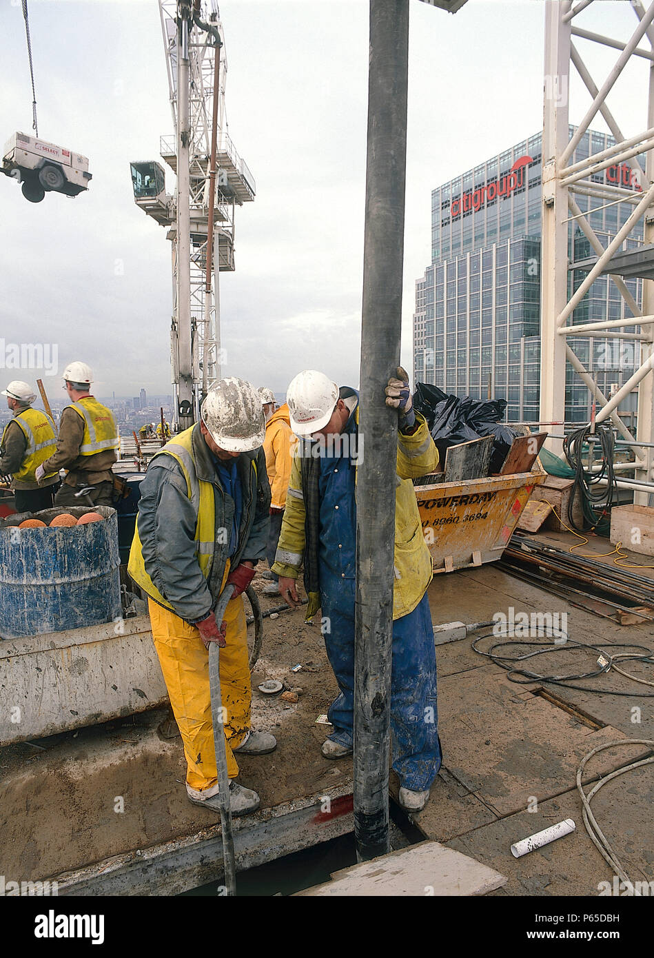 Placing and compacting in situ concrete on top of Heron Quays tower ...