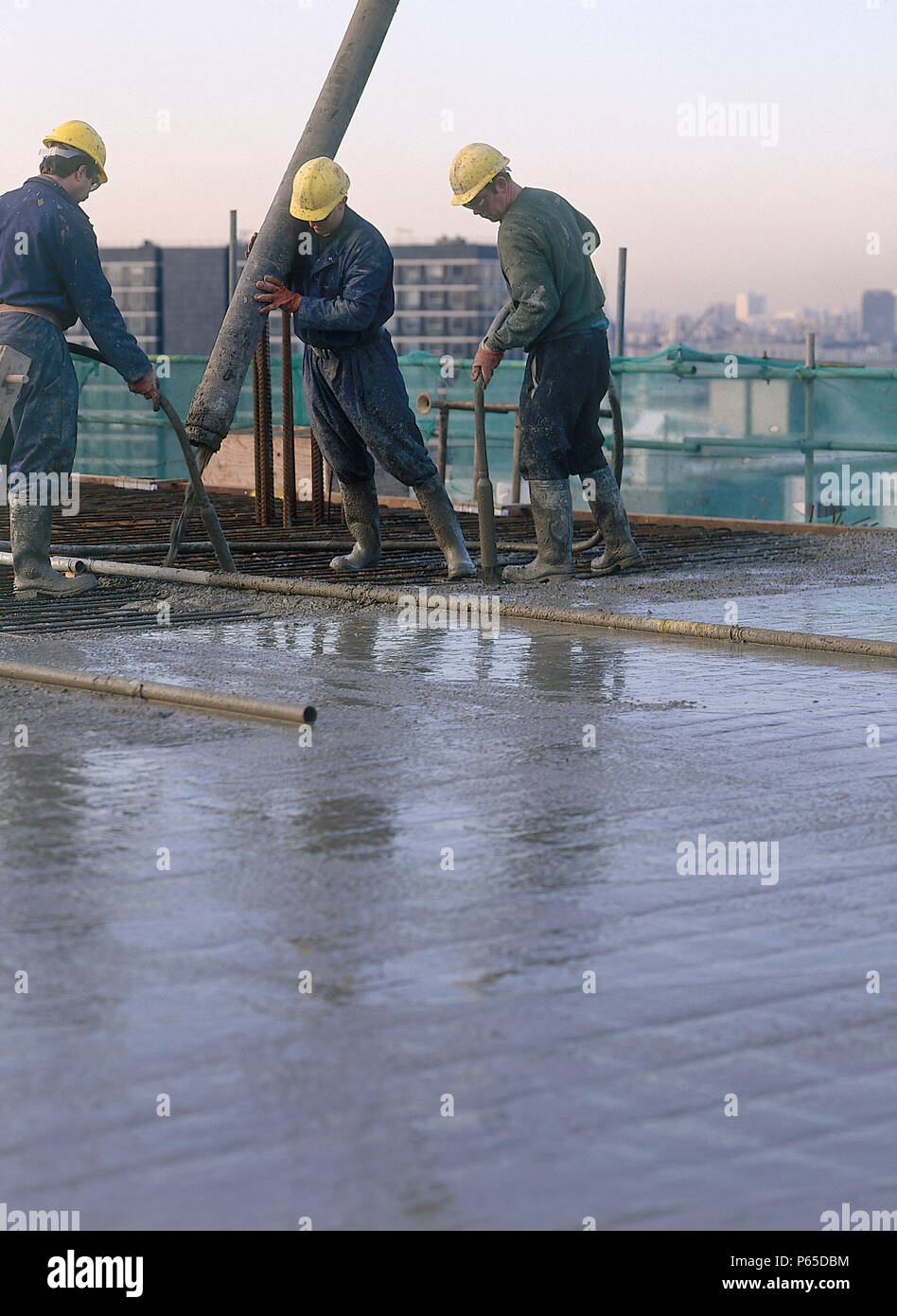 Pouring and compacting in situ reinforced concrete using pump and ...