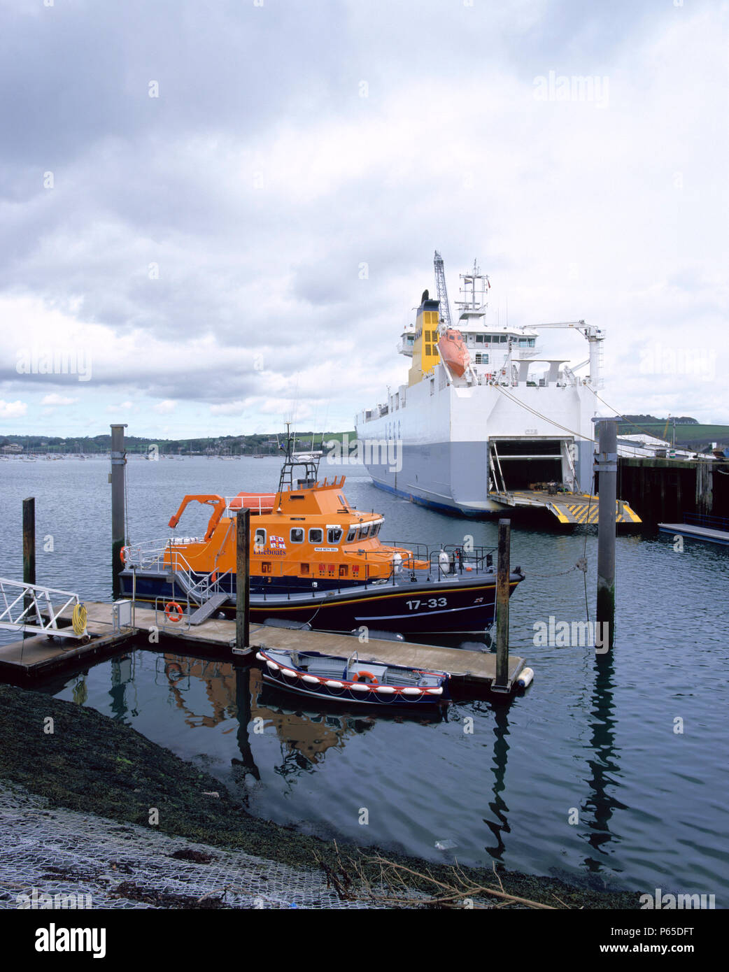 Falmouth lifeboat and cargo ship in Falmouth docks. Cornwall, United ...