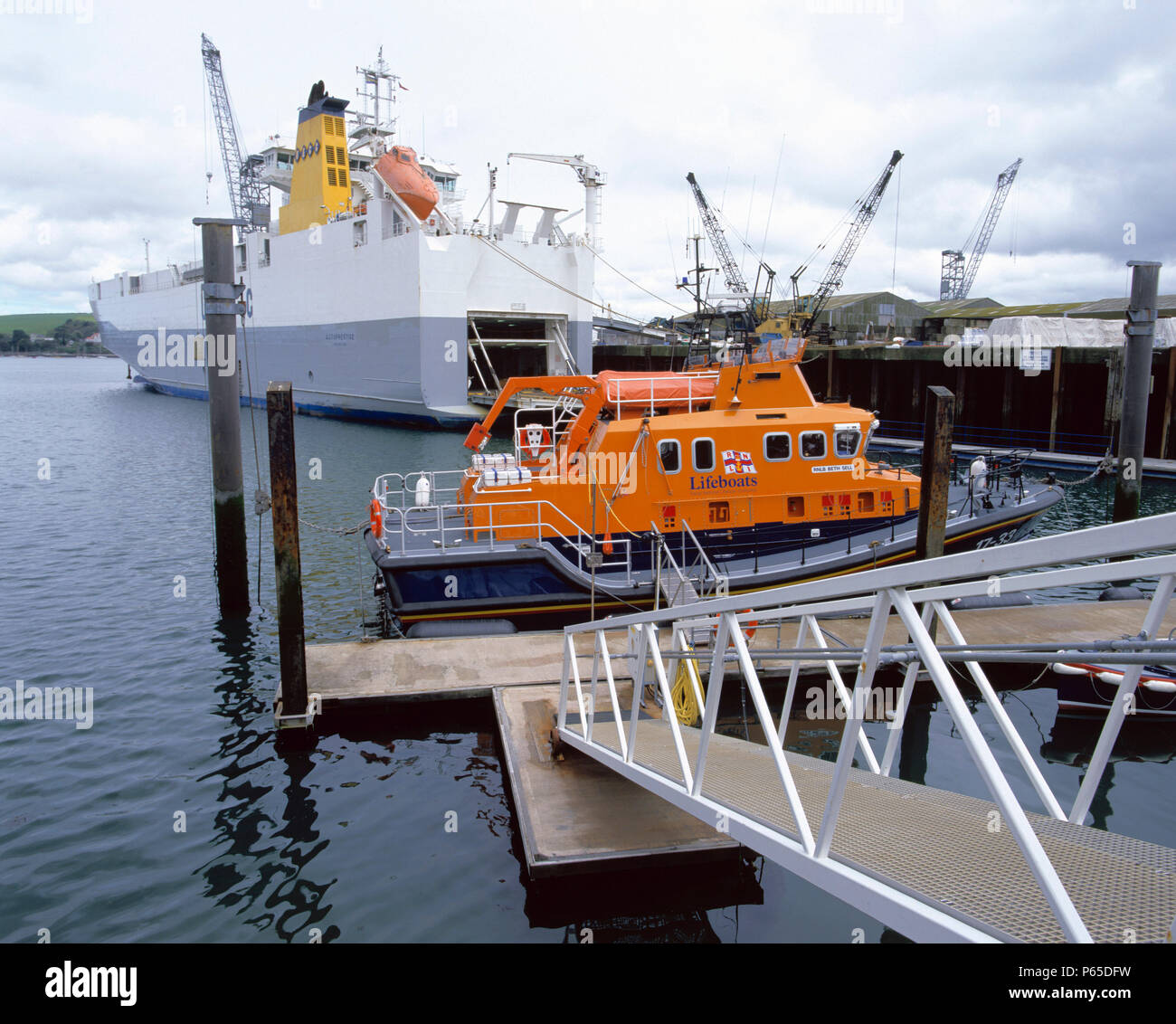 Falmouth lifeboat and cargo ship in Falmouth docks. Cornwall, United ...