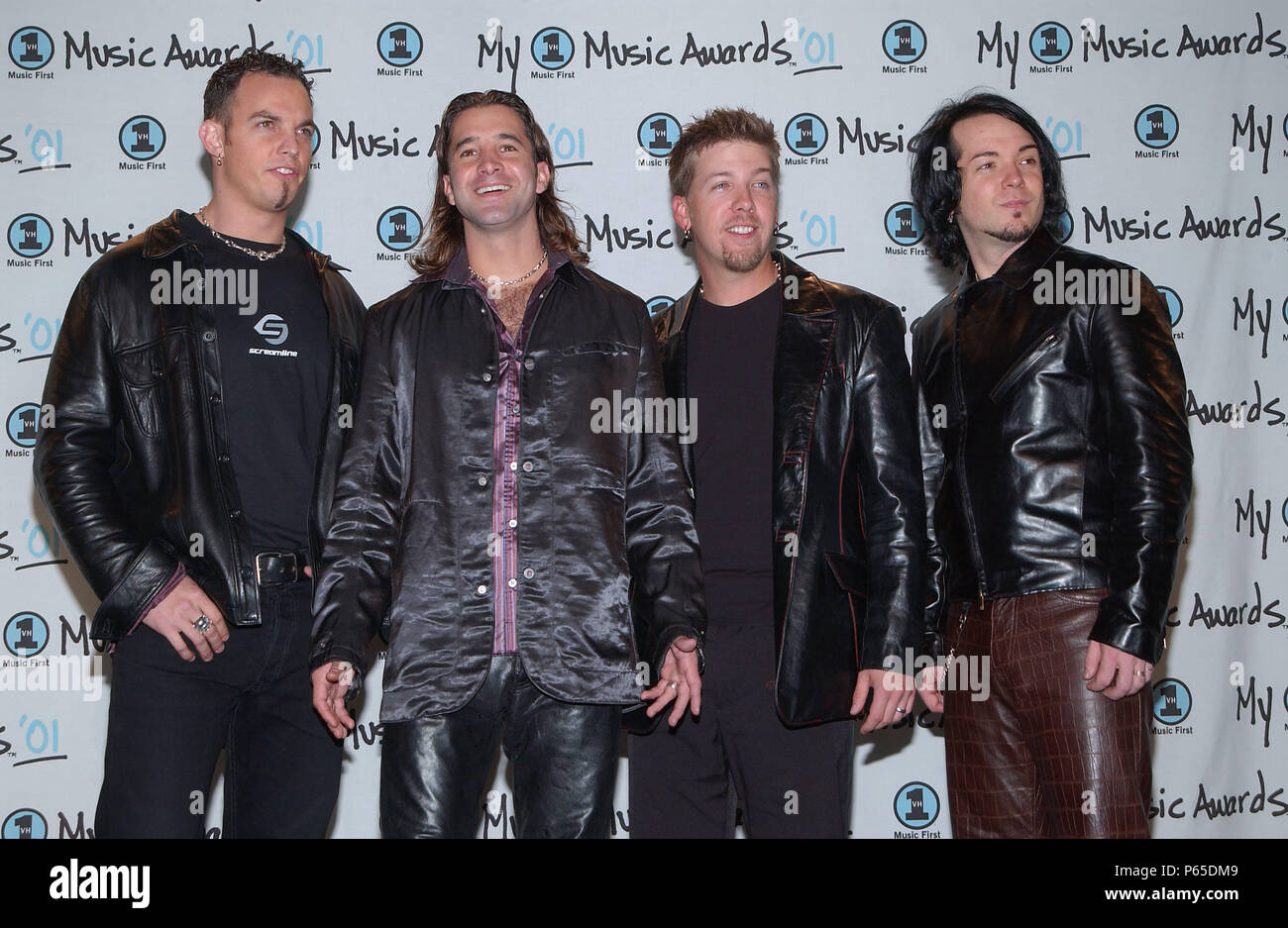 Scott Stapp, second from left, with Creed in the pressroom at the My ...