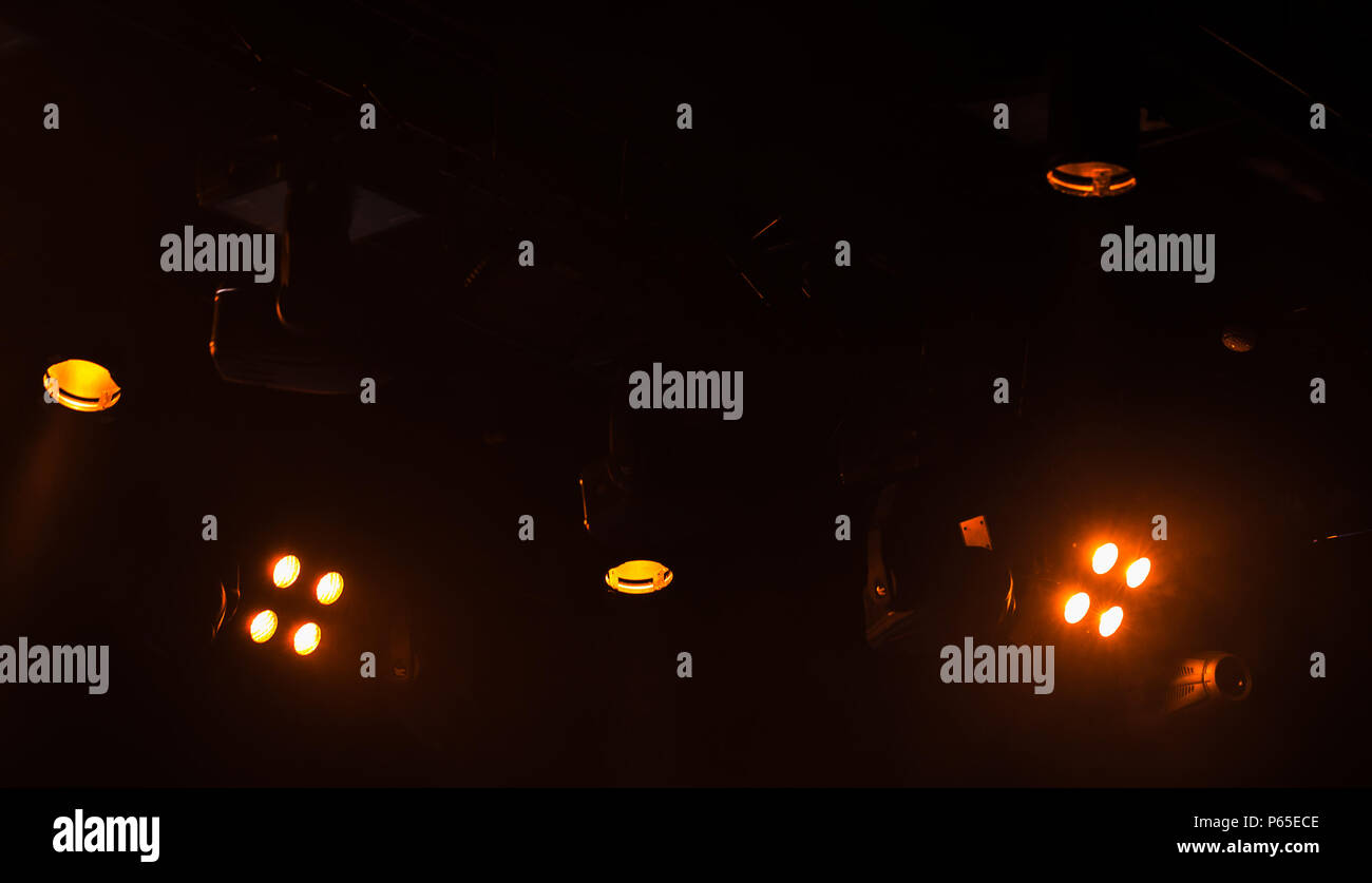 Red strobe lights over dark background, modern stage illumination ...