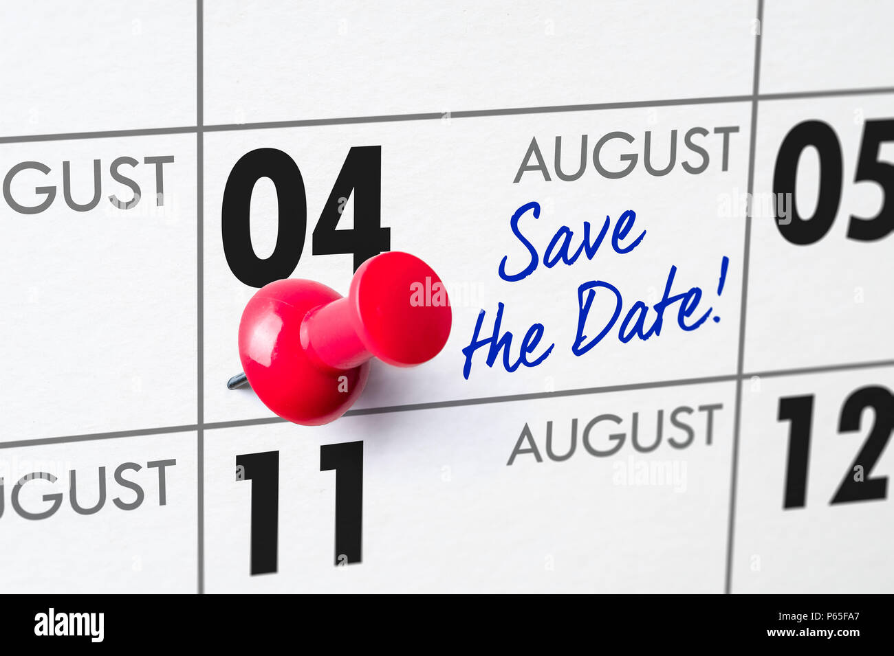 Wall calendar with a red pin - August 04 Stock Photo - Alamy