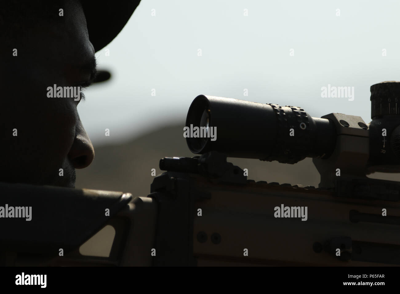 A Dominican Republic special operations competitor aims his sniper ...