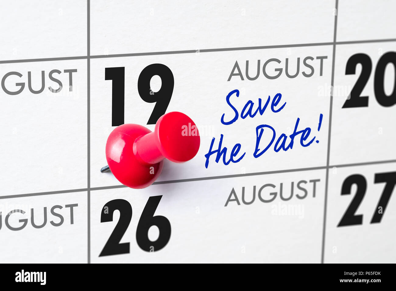 Wall calendar with a red pin - August 19 Stock Photo - Alamy