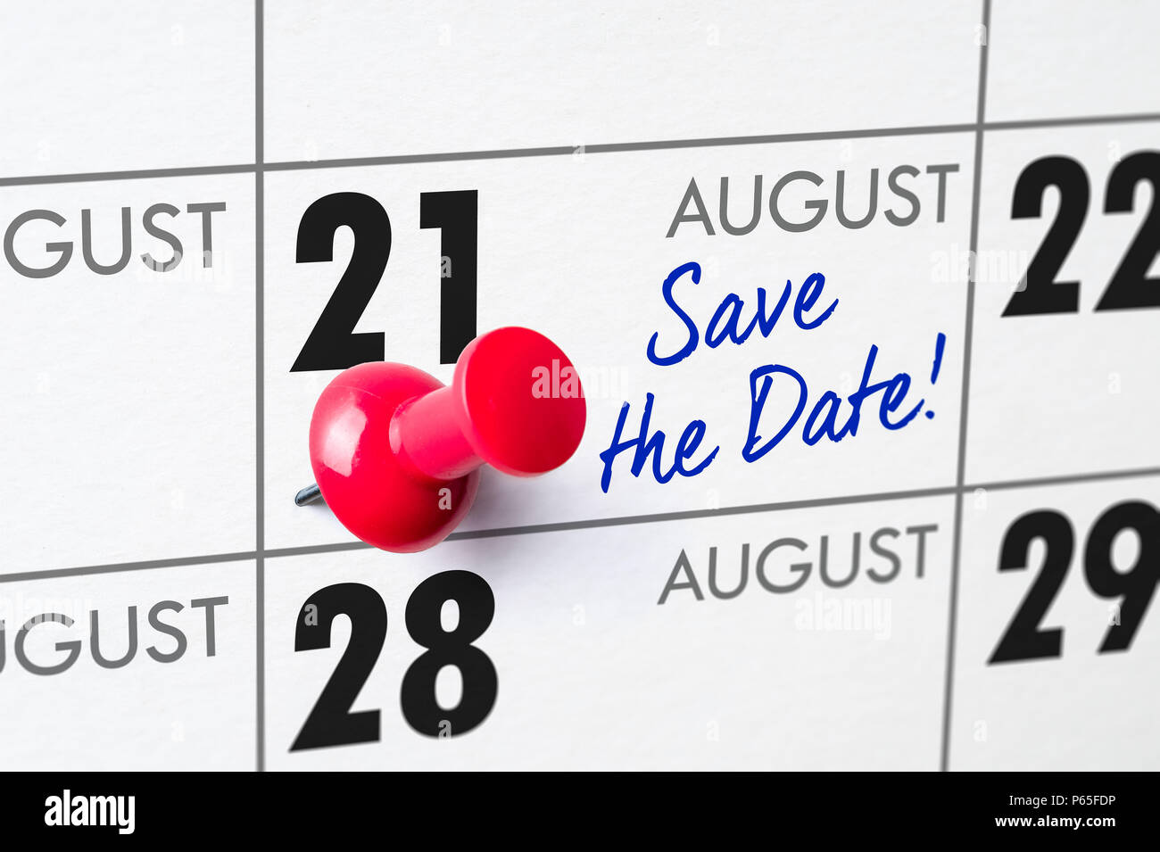 Wall calendar with a red pin - August 21 Stock Photo - Alamy