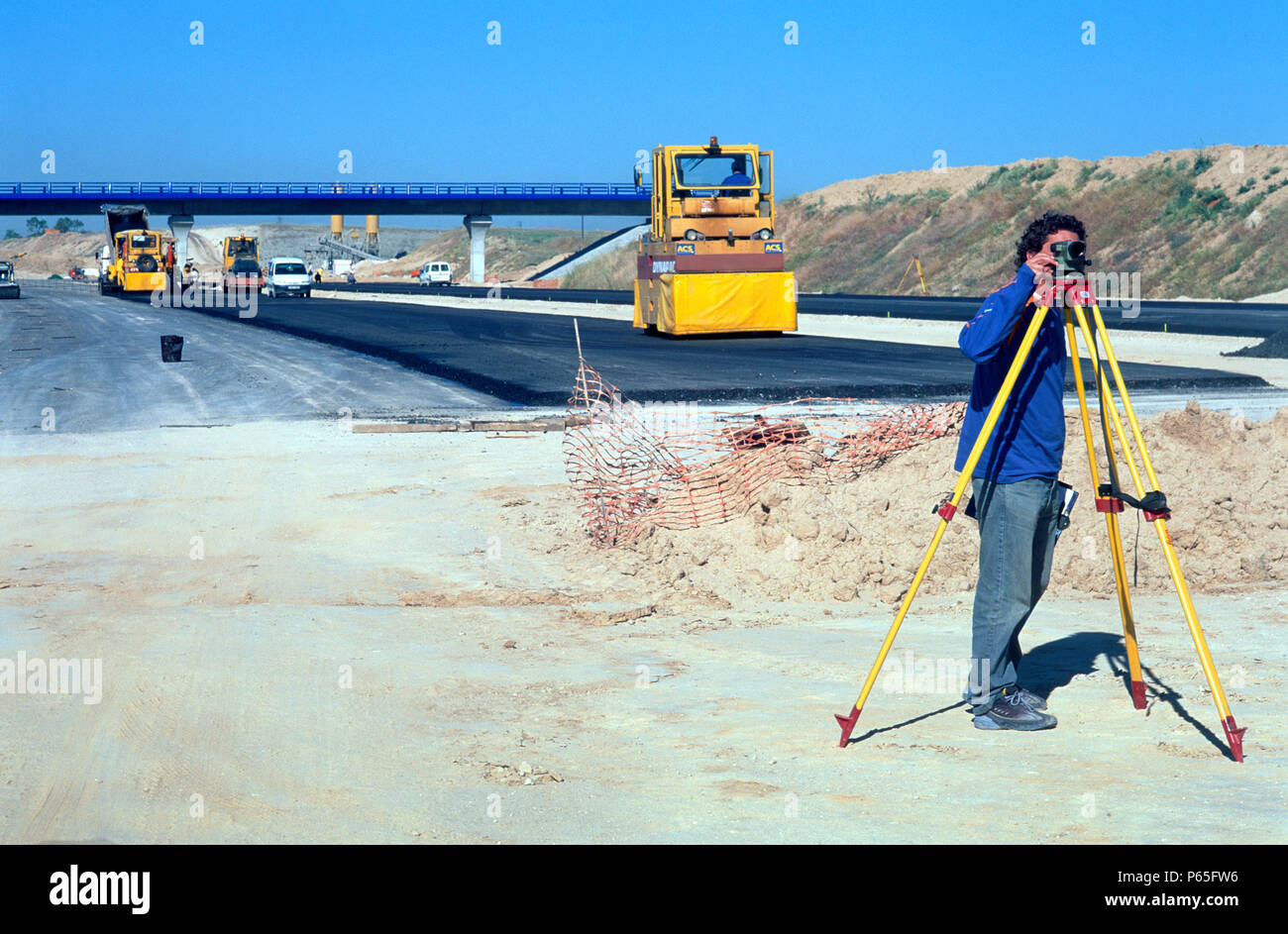 Surveyor road work Stock Photo - Alamy