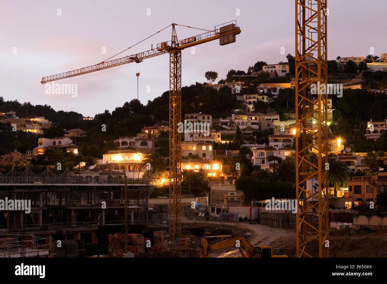 Tower cranes overlooking a new property development in Benissa, Costa ...