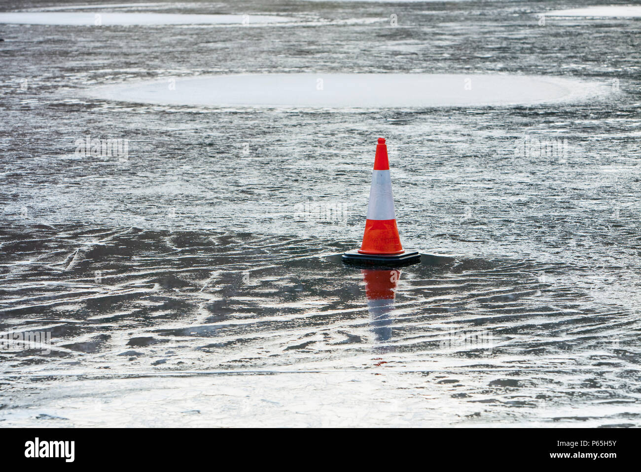 Traffic cone in water hi-res stock photography and images - Alamy