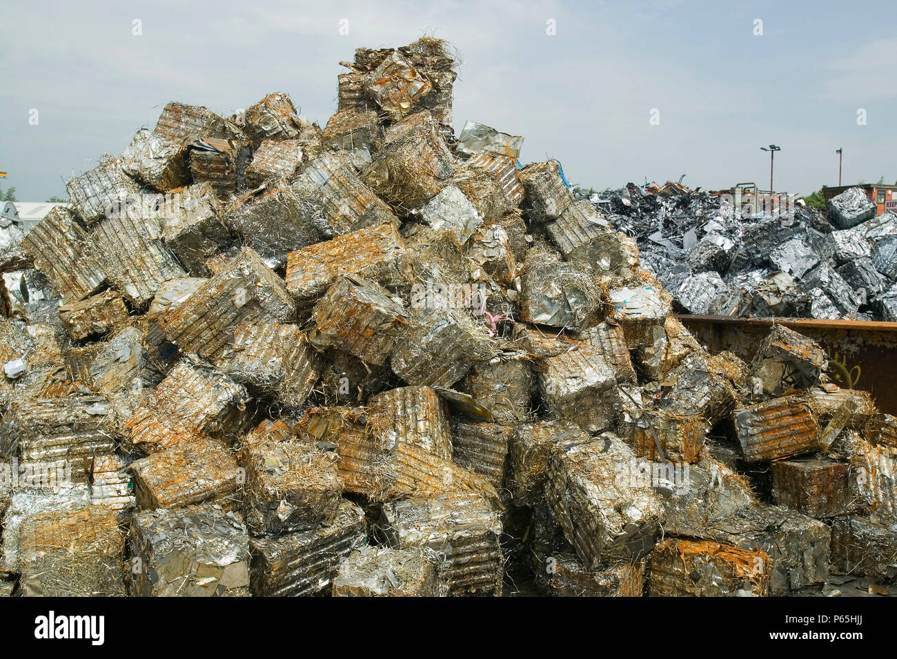 Recycling waste metal in Blackburn, UK. Recycling saves huge amounts of ...