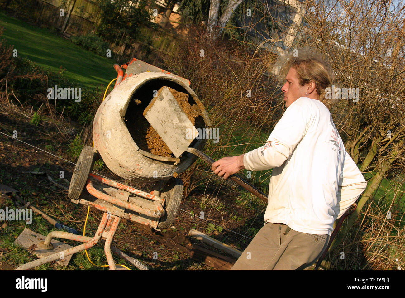 Man Making Cement Stock Photo - Alamy