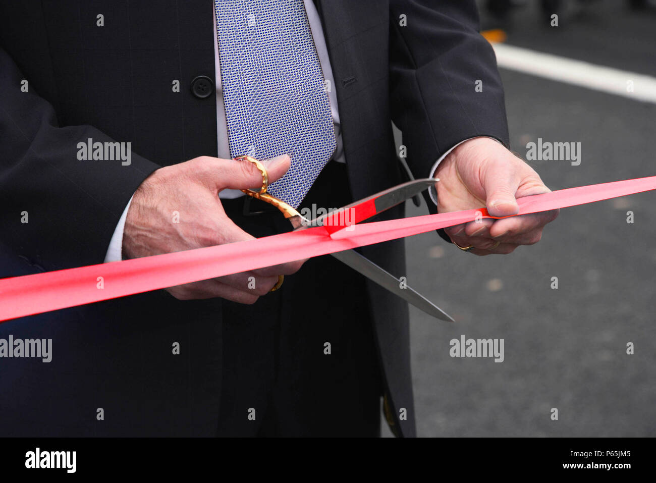 Cutting ribbon hi-res stock photography and images - Alamy