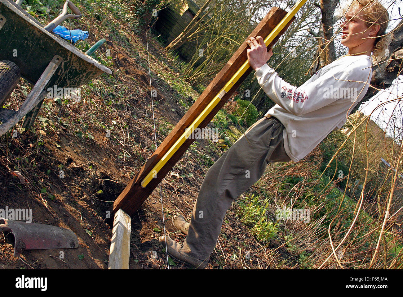 Man Building Fence Stock Photo - Alamy