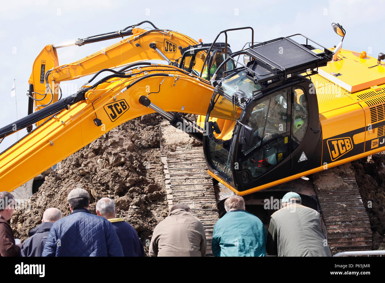 JCB digger being demonstrated Stock Photo - Alamy