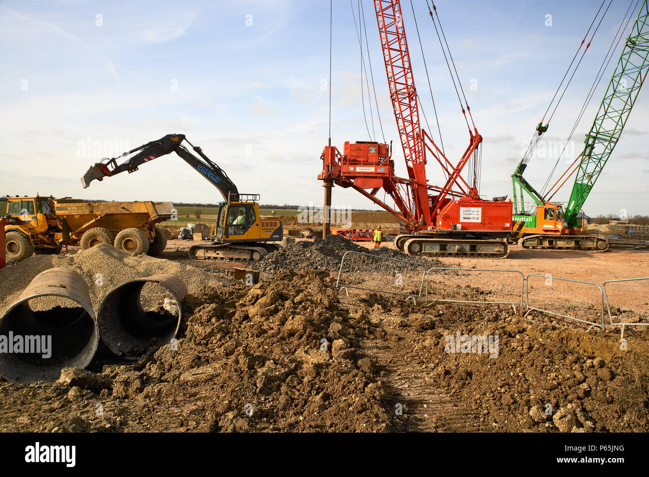 Groundworks in progress with piling rig Stock Photo - Alamy