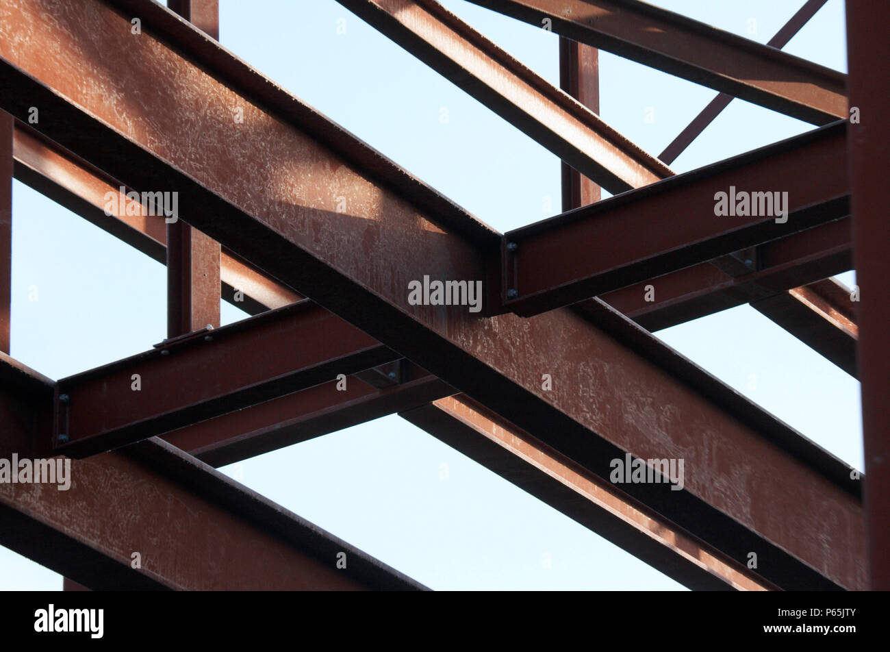 Construction worker working on a steel frame building Stock Photo - Alamy
