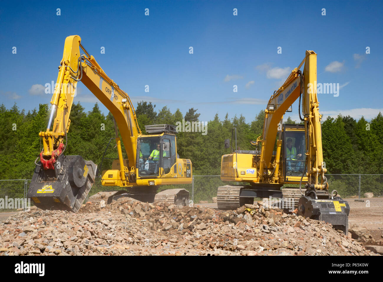 Yellow diggers hi-res stock photography and images - Alamy