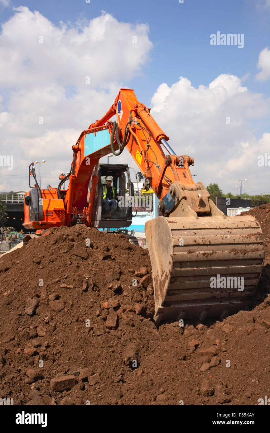 Orange Digger, UK Stock Photo - Alamy