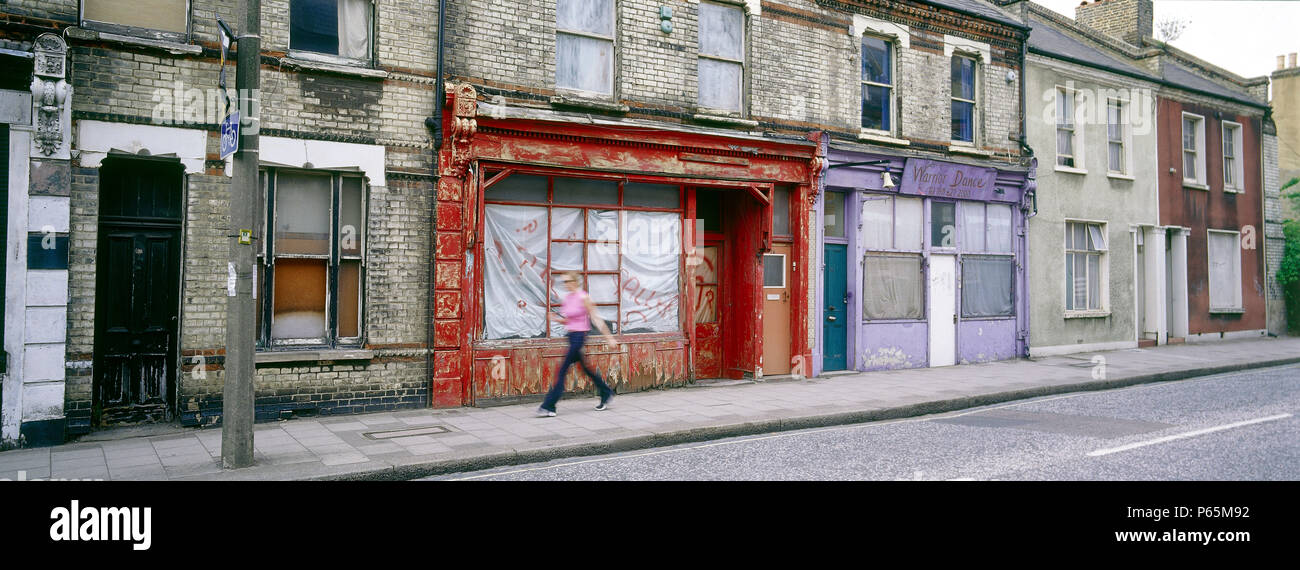 Derelict terraced shop fronts and housing. Clapham Common. Rectory ...