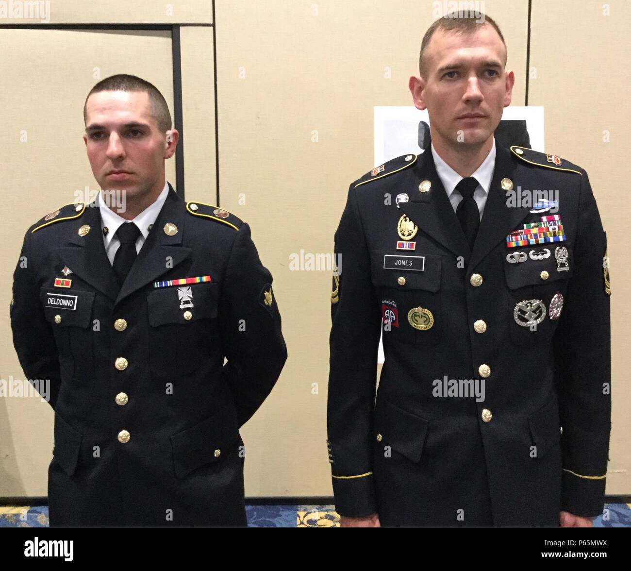 (L-R) Spc. Carlo Deldonno, representing the 3rd Medical Command ...