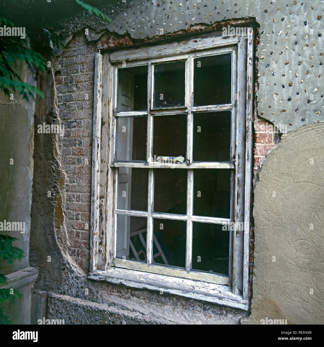 Old window in total decay Stock Photo - Alamy