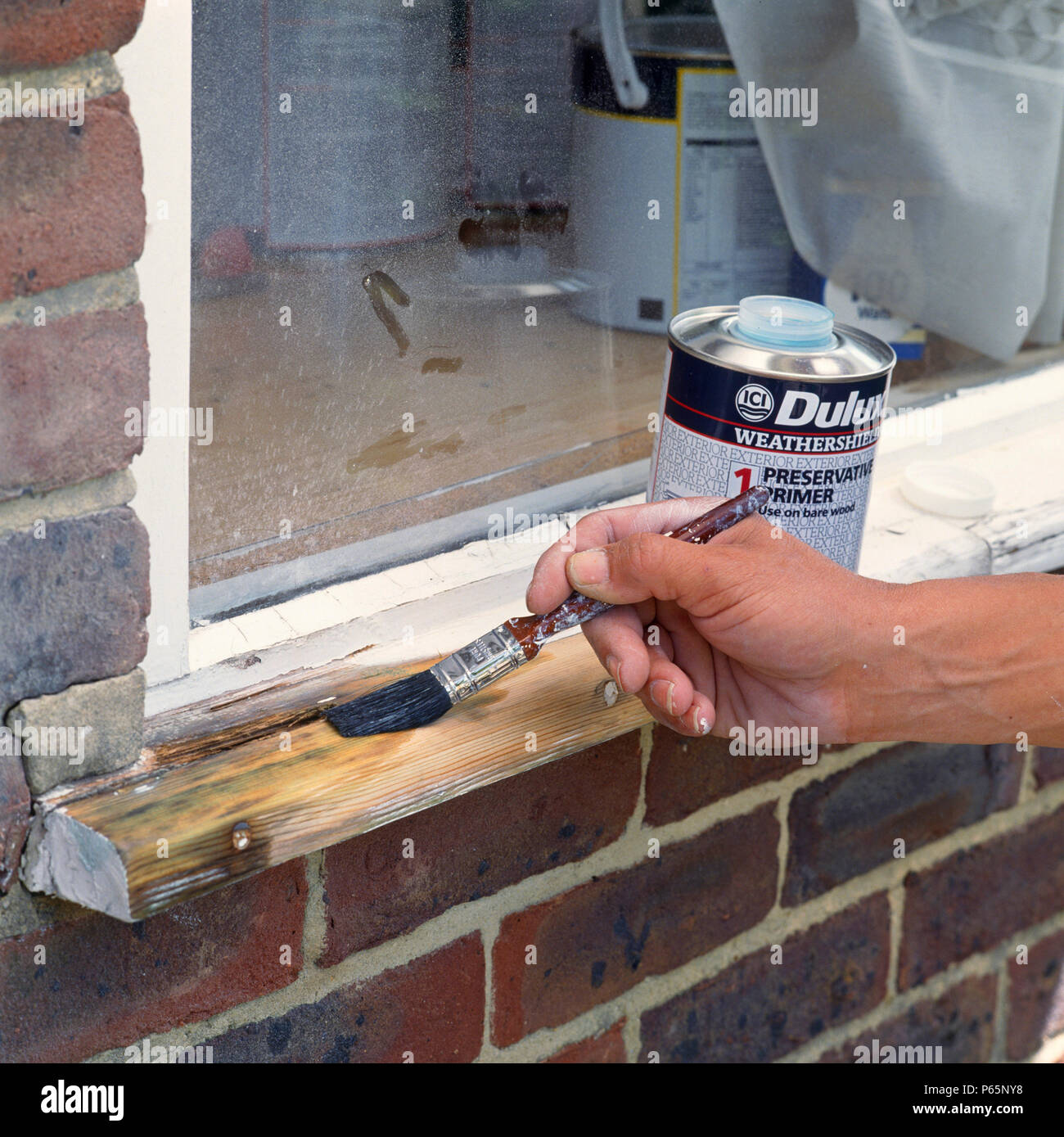 Repairing a damaged window Stock Photo - Alamy