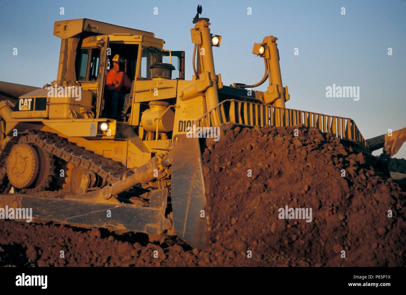 Bulldozer pushing dirt for large housing development in California