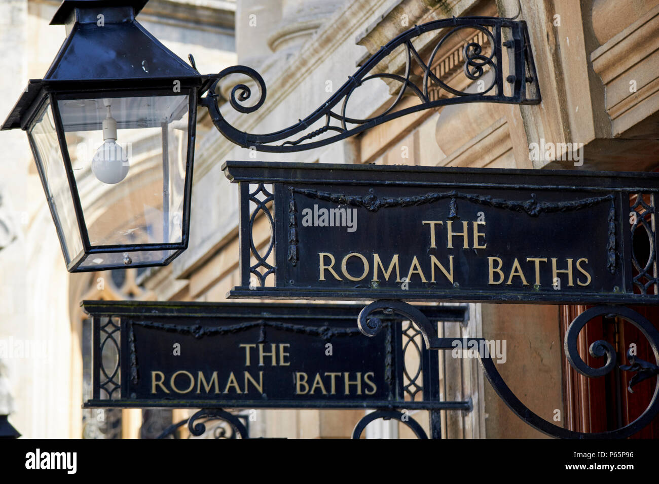 Signs for the roman baths in Bath England UK Stock Photo - Alamy