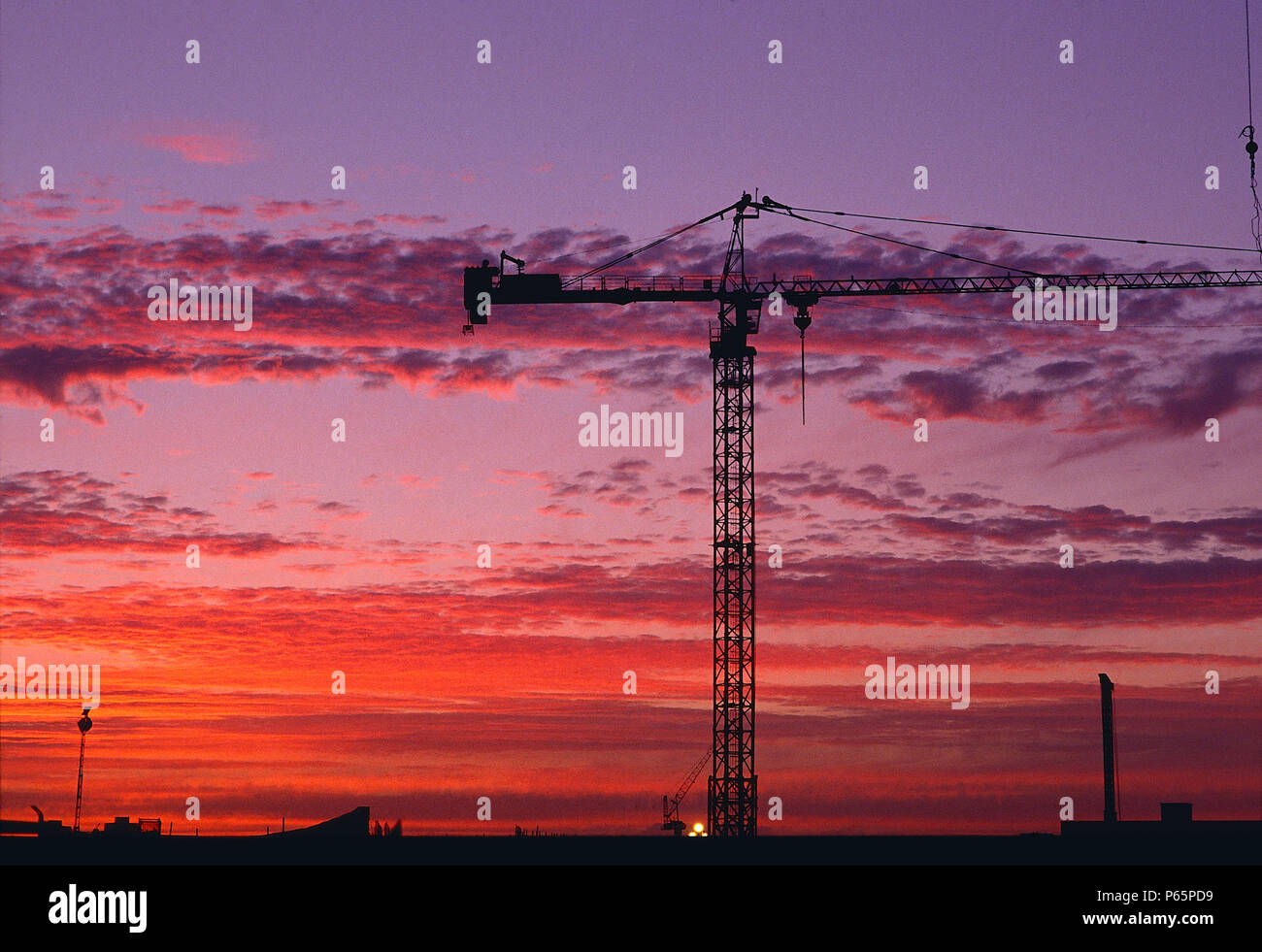 Tower crane at dusk Stock Photo - Alamy