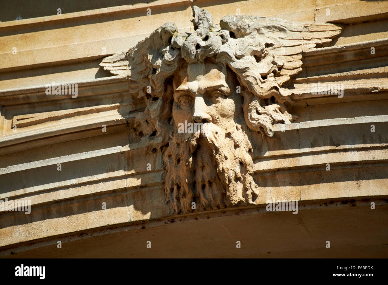 head of neptune carved in stone on the keystone Bath England UK Stock ...