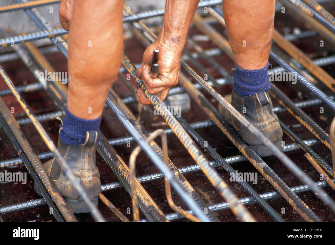 Fixing steel frame, foundations Stock Photo - Alamy
