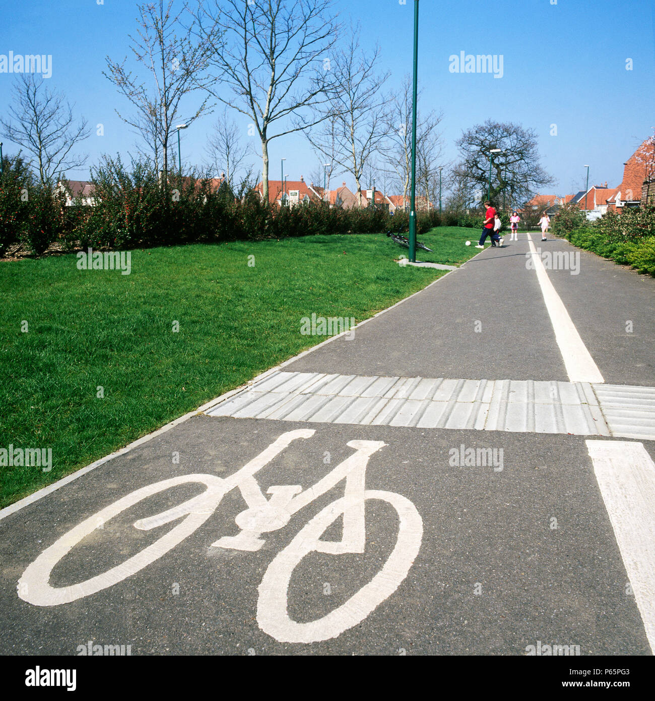 Cycle lane in suburban environment Stock Photo - Alamy