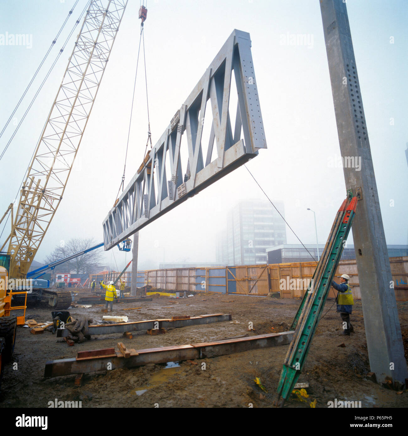 Steel structure being lifted by a crane Stock Photo - Alamy