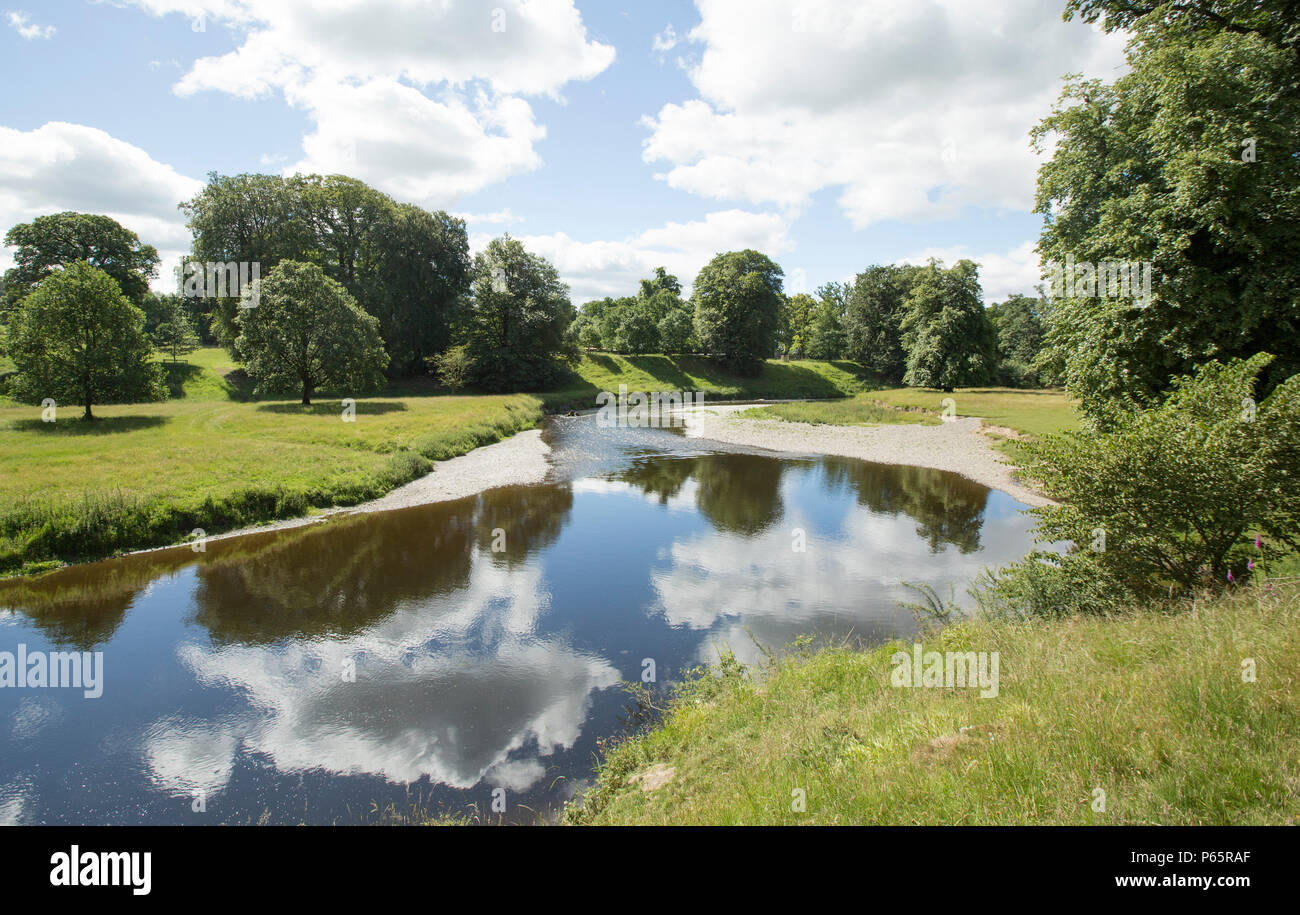 The River Kent flowing through Levens Hall Park in Cumbria England UK ...