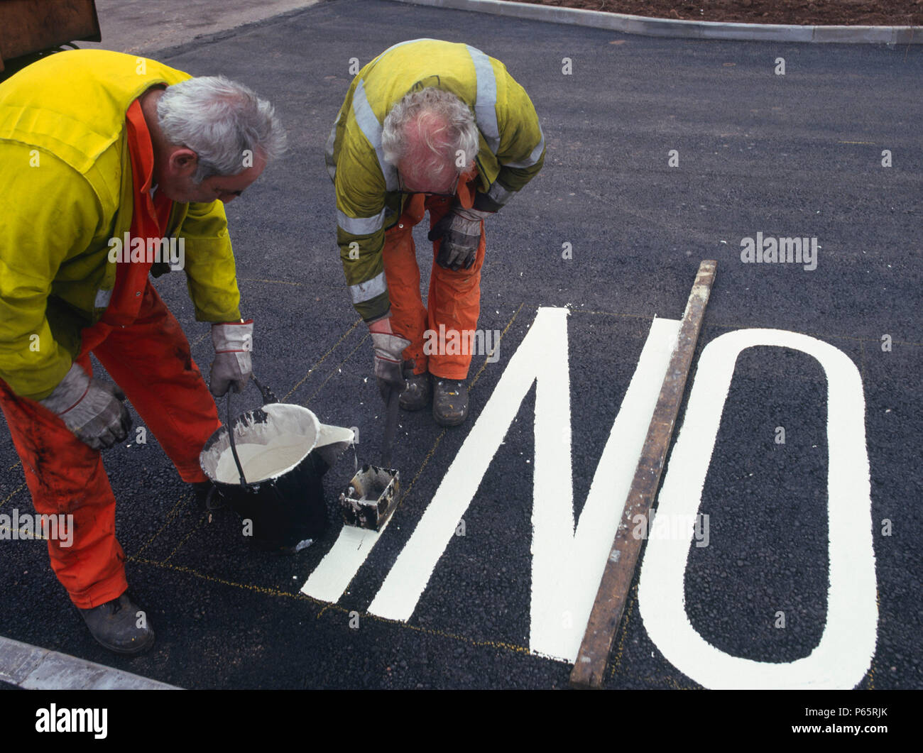 Marking signs on a lay by road Stock Photo - Alamy