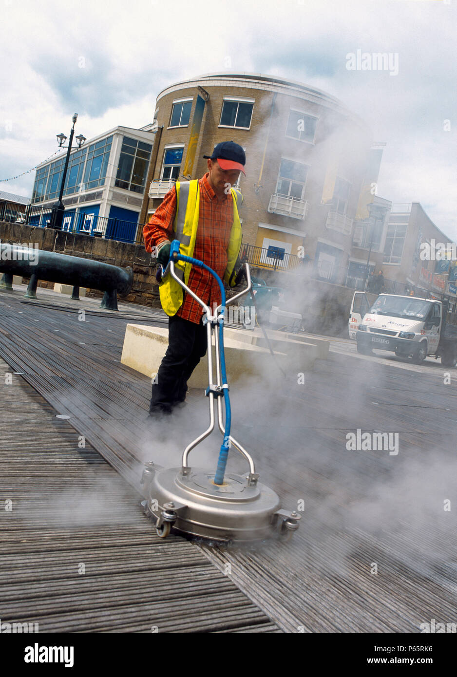 Cleaning outside deck platform Stock Photo - Alamy