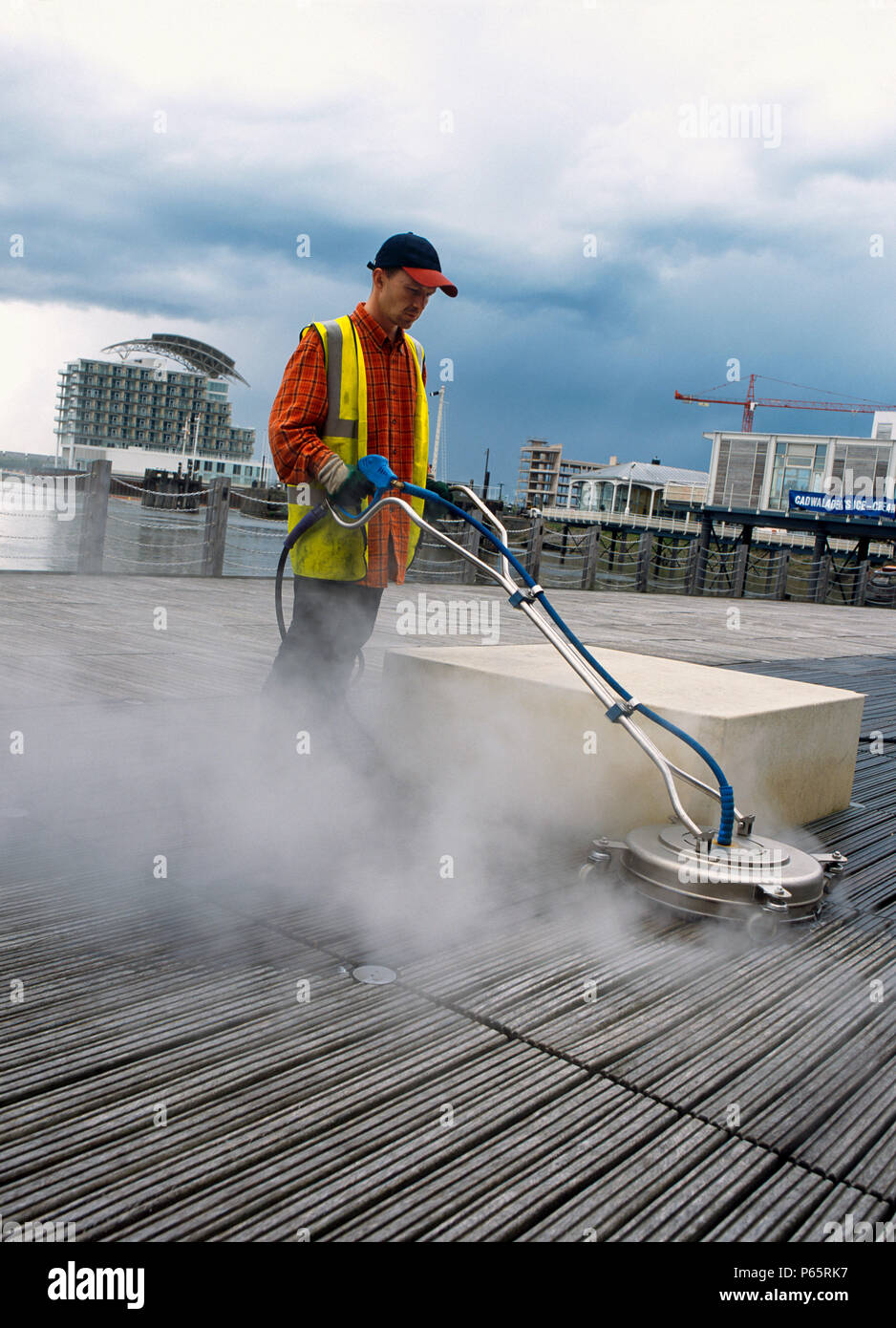 Cleaning outside deck platform Stock Photo - Alamy