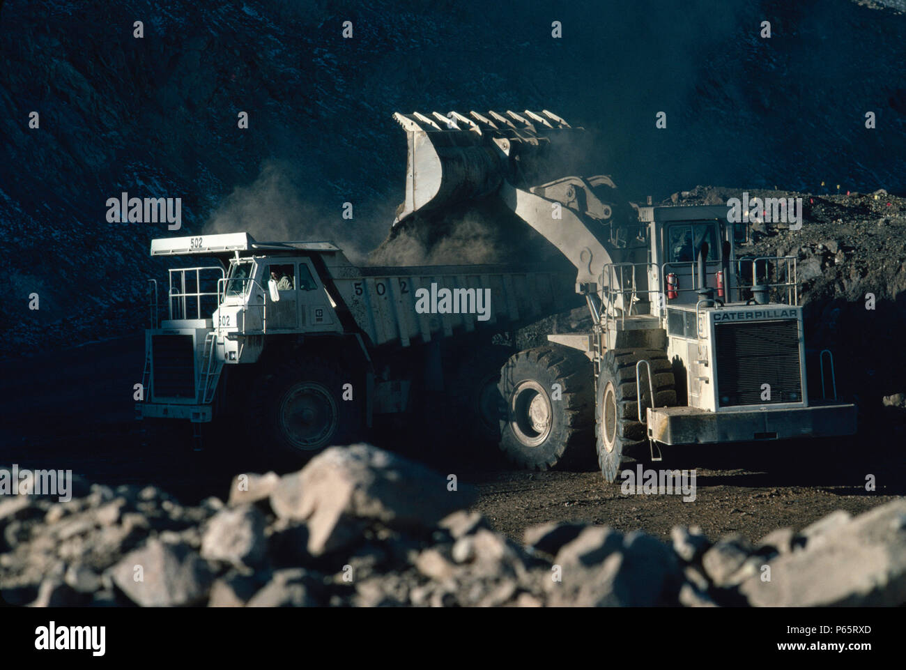 Caterpillar loader and Caterpillar 502 rigid quarry truck Stock Photo ...