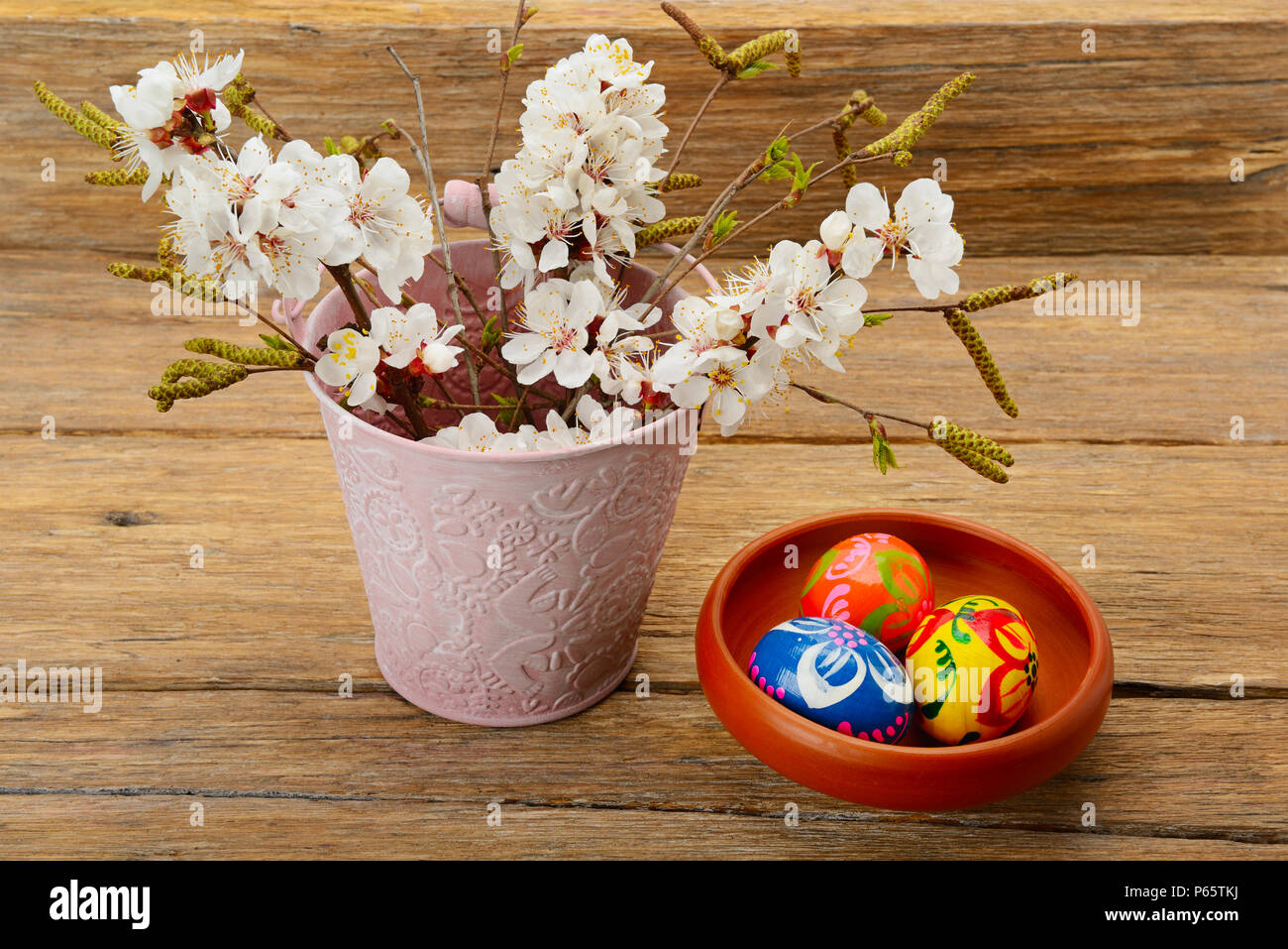 Easter eggs and twigs with flowers of apricot Stock Photo - Alamy