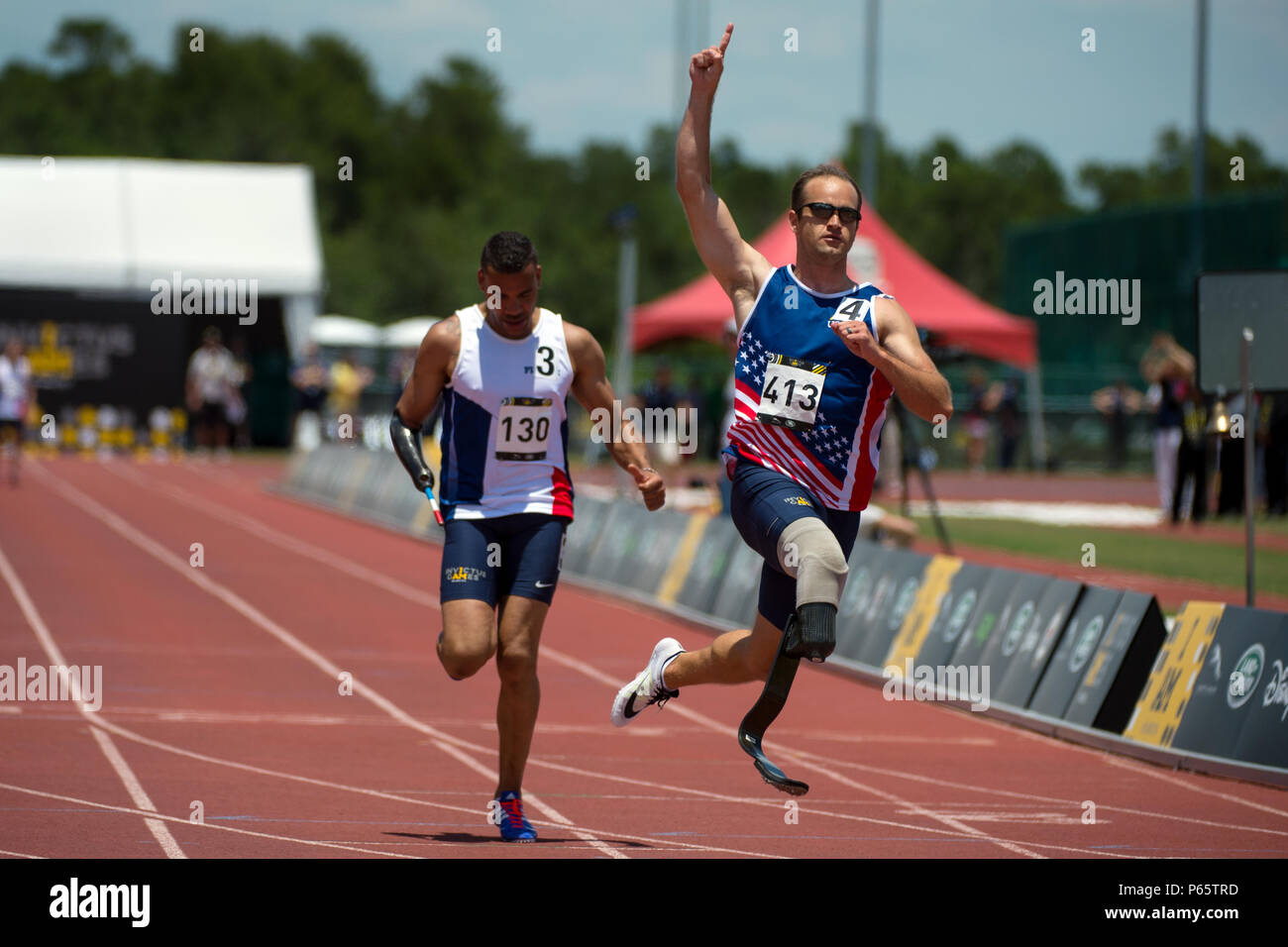 A U.S. Invictus team member Robert Brown reacts to winning the team ...