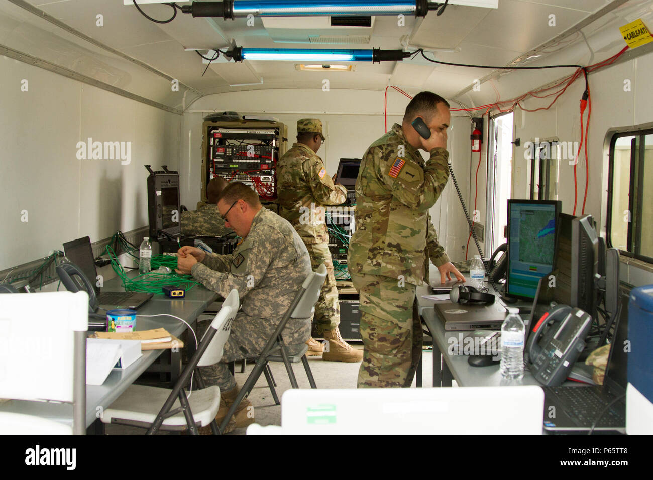 Members from CCE3 perform email and phone communications suite checks ...