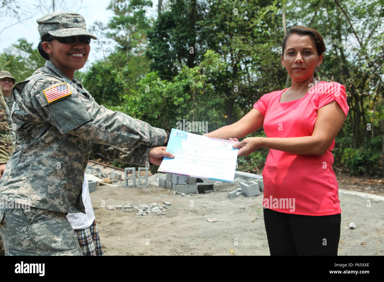 Guatemalan Professor Maria Teresa De Leon present U.S. Army Sgt. Anna ...