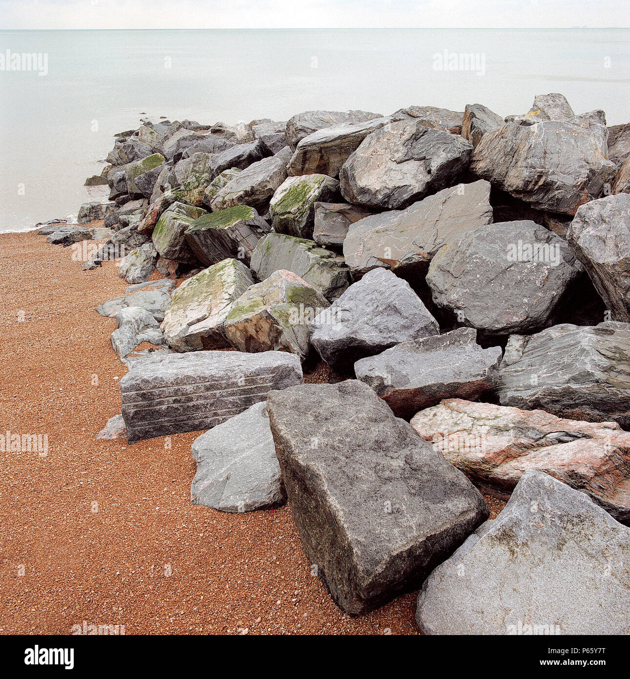 New stone groyne for coastal protection Stock Photo - Alamy