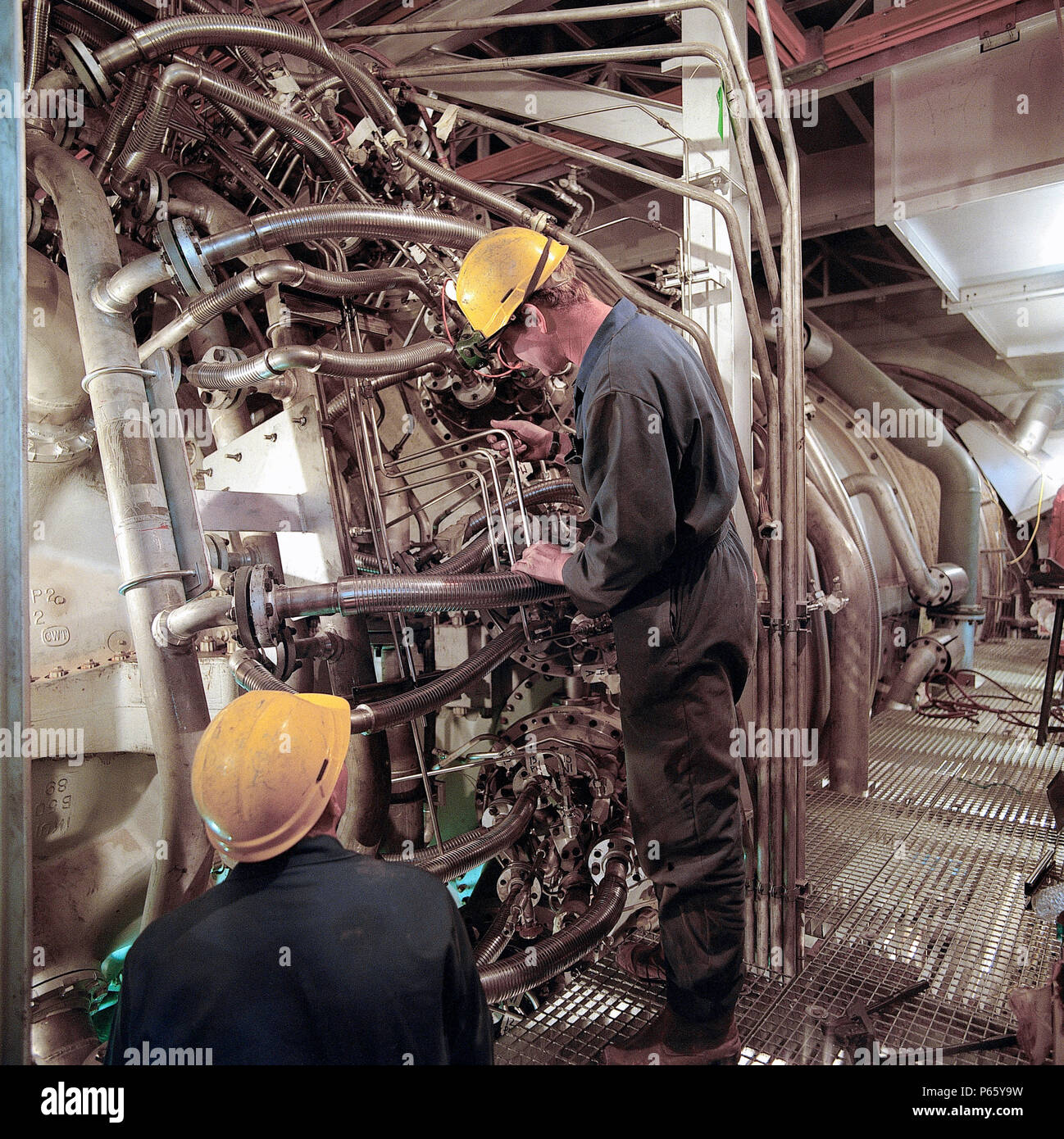 Installing turbine inside power station Stock Photo - Alamy