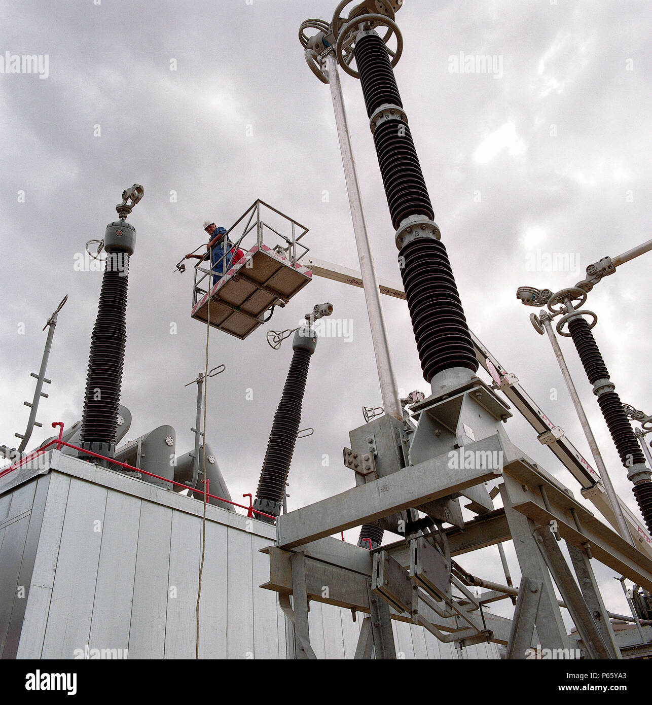 Installing electrical equipment at power station Stock Photo - Alamy
