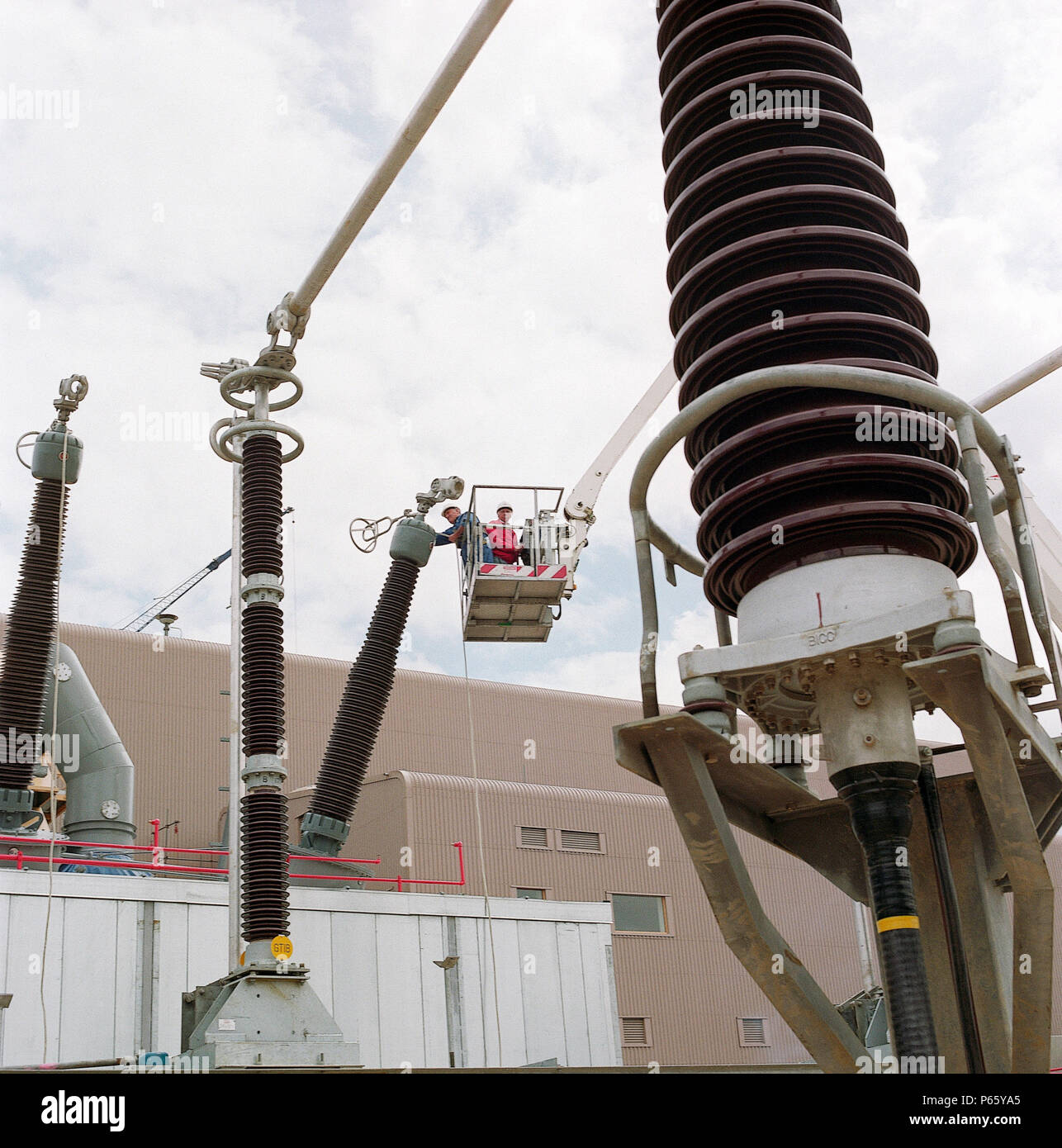 Installing electrical equipment at power station Stock Photo - Alamy