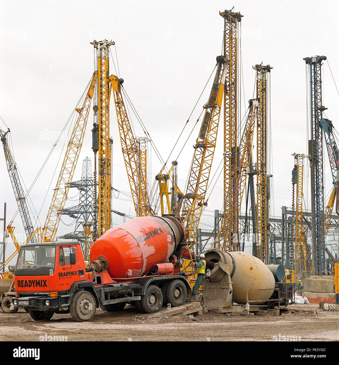 Mobile and static concrete mixers at the start of construction of the ...