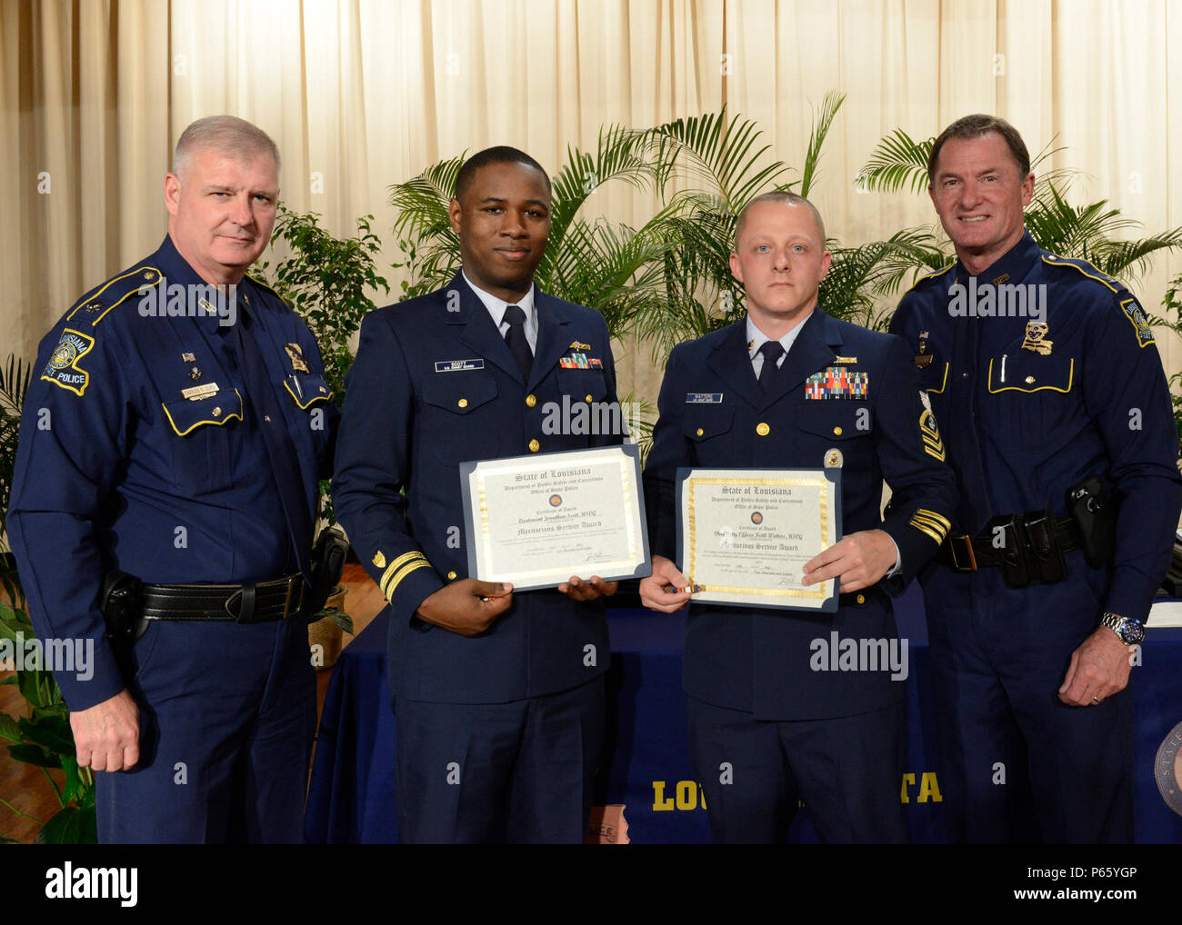 BATON ROUGE, La. - Coast Guard Lt. Jonathan Scott and Chief Petty ...