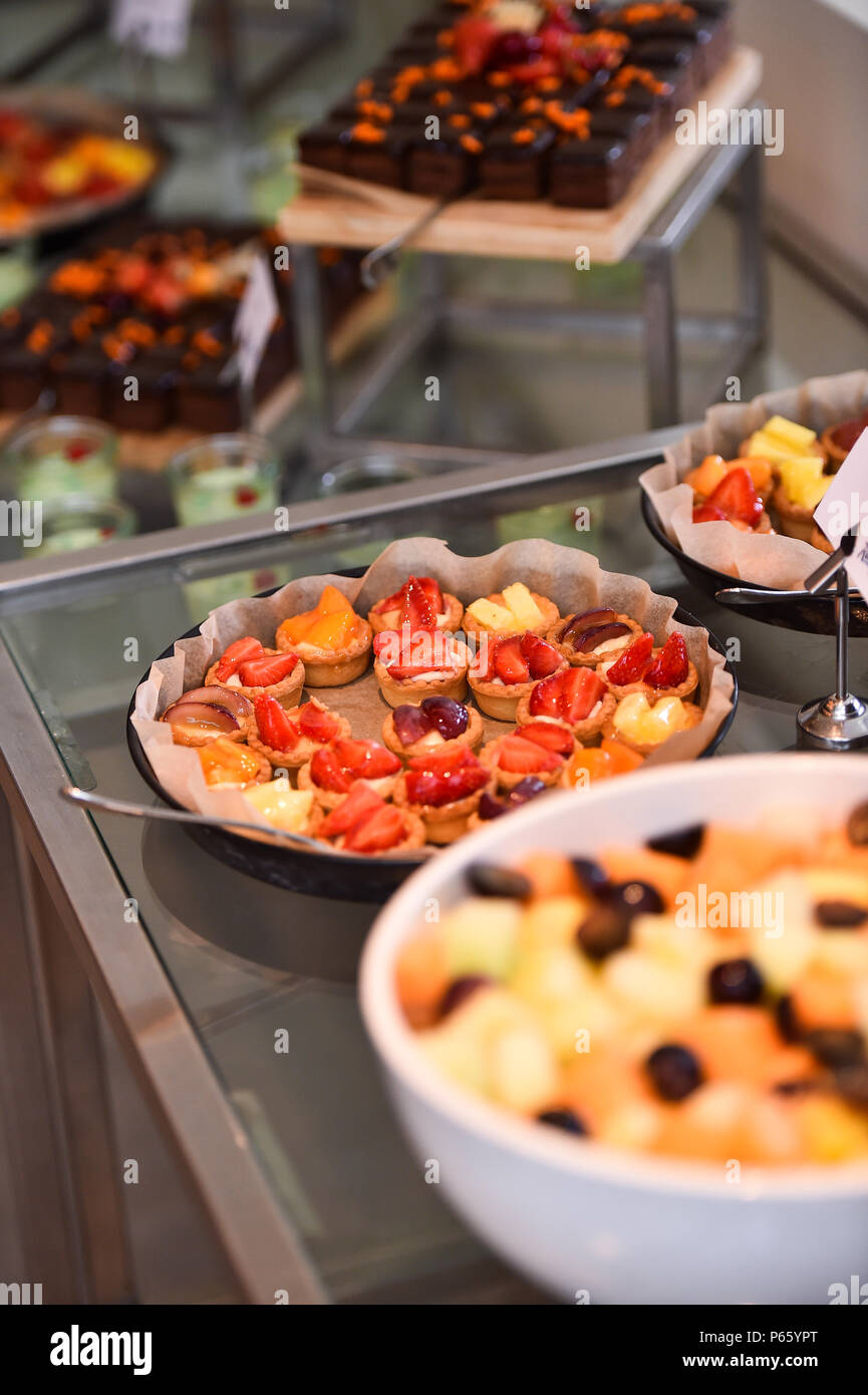 Catering service with delicious deserts and fruit tarts Stock Photo - Alamy